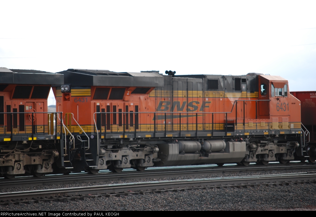 BNSF 6431 rolls west as a 2d unit on a westbound mty coal train.
